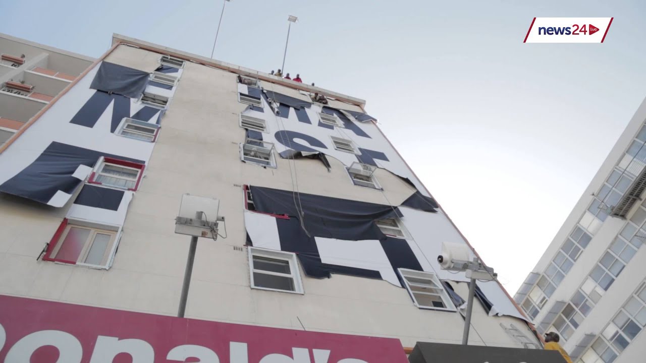 Footage shows moment ANC supporters tore down Zuma Must Fall billboard ...