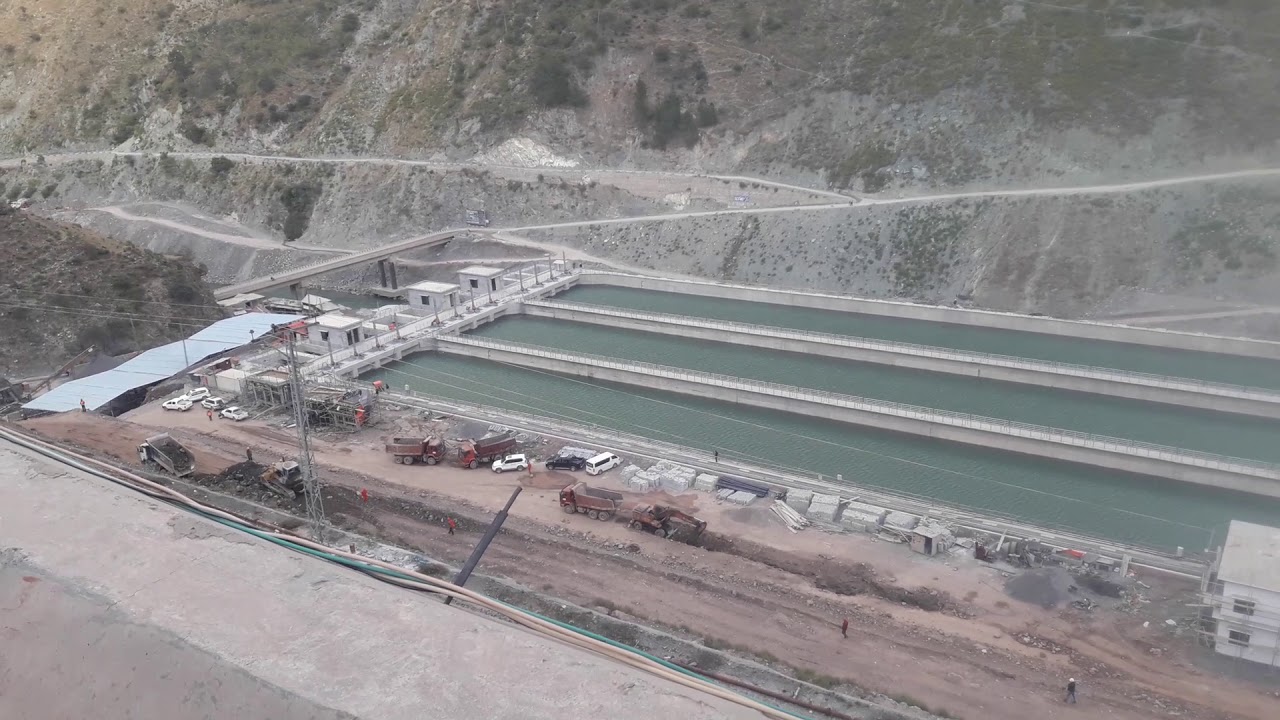 Dam and man working - YouTube