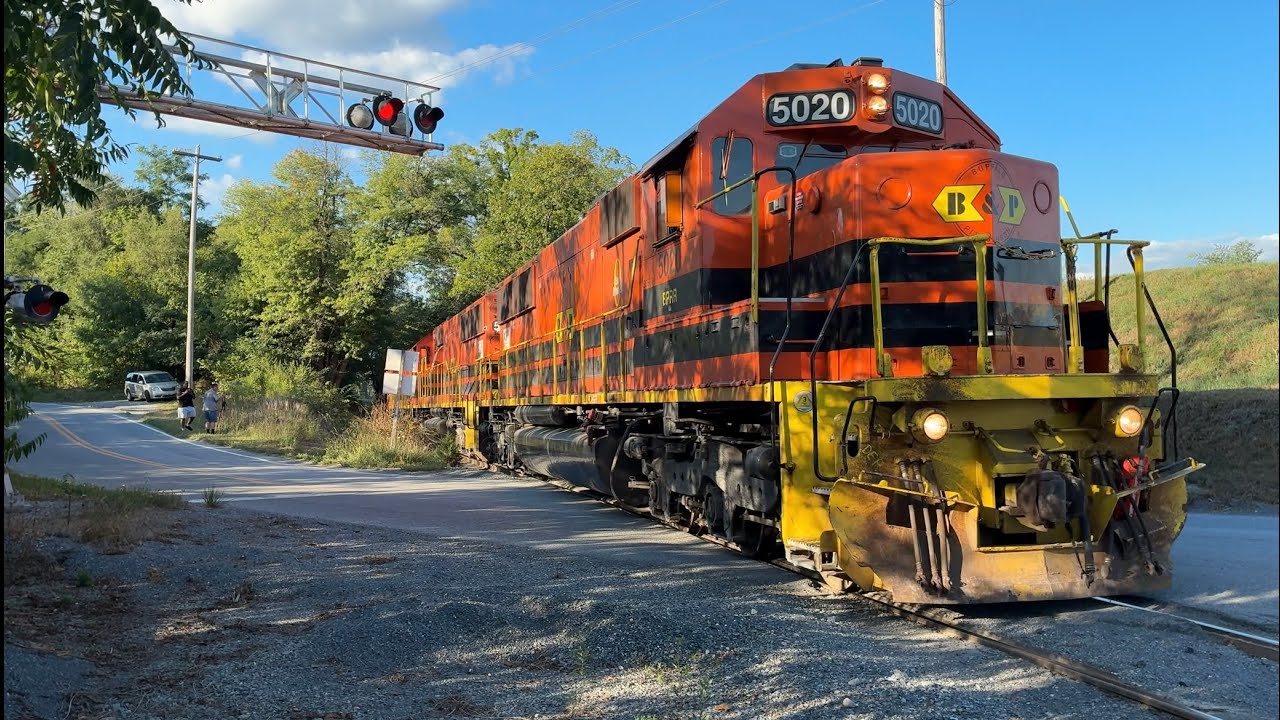 Classic EMDs pull a loaded rock train into the late evening on the ...