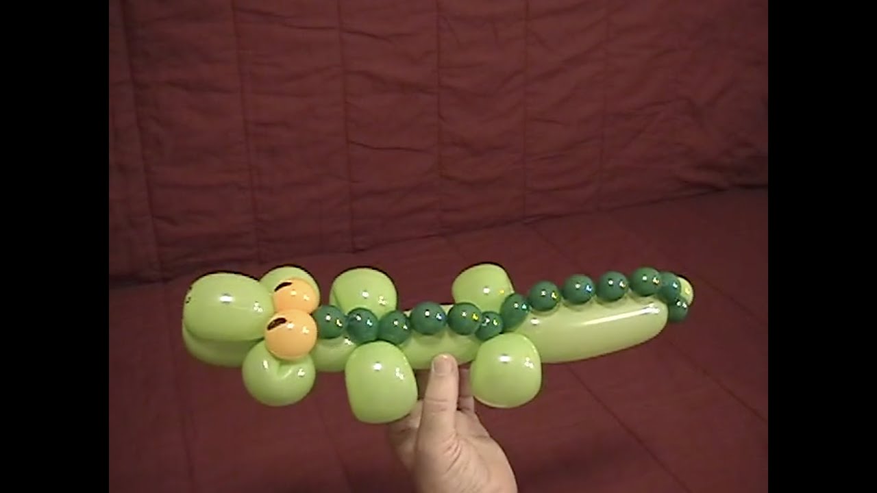 Learn how to make a fun balloon animal alligator using balloon twisting ...