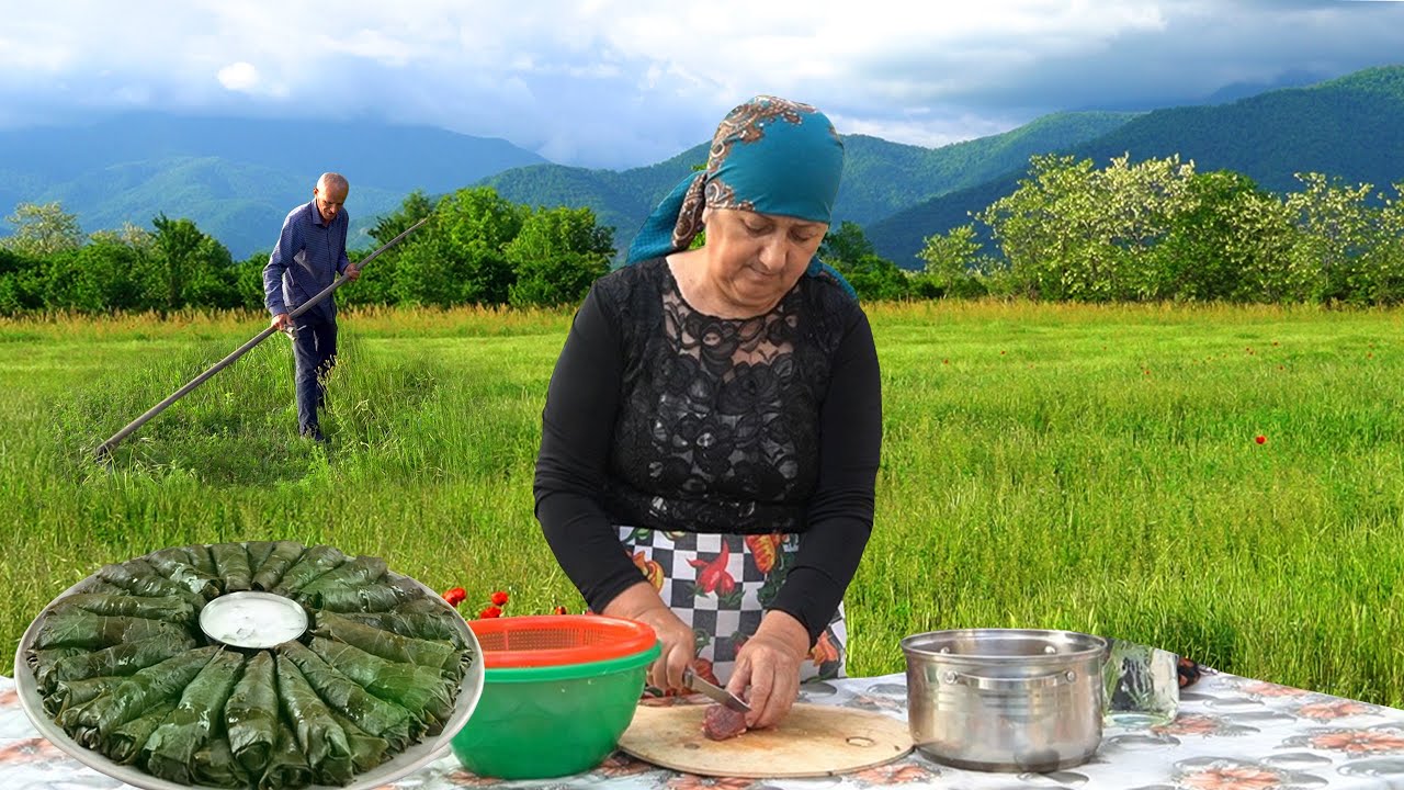 Grandmother cooking stuffing from the leaves of the linden tree in the ...