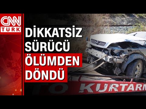 Hızla gelen treni eliyle durdurmaya çalışınca arabası param parça oldu
