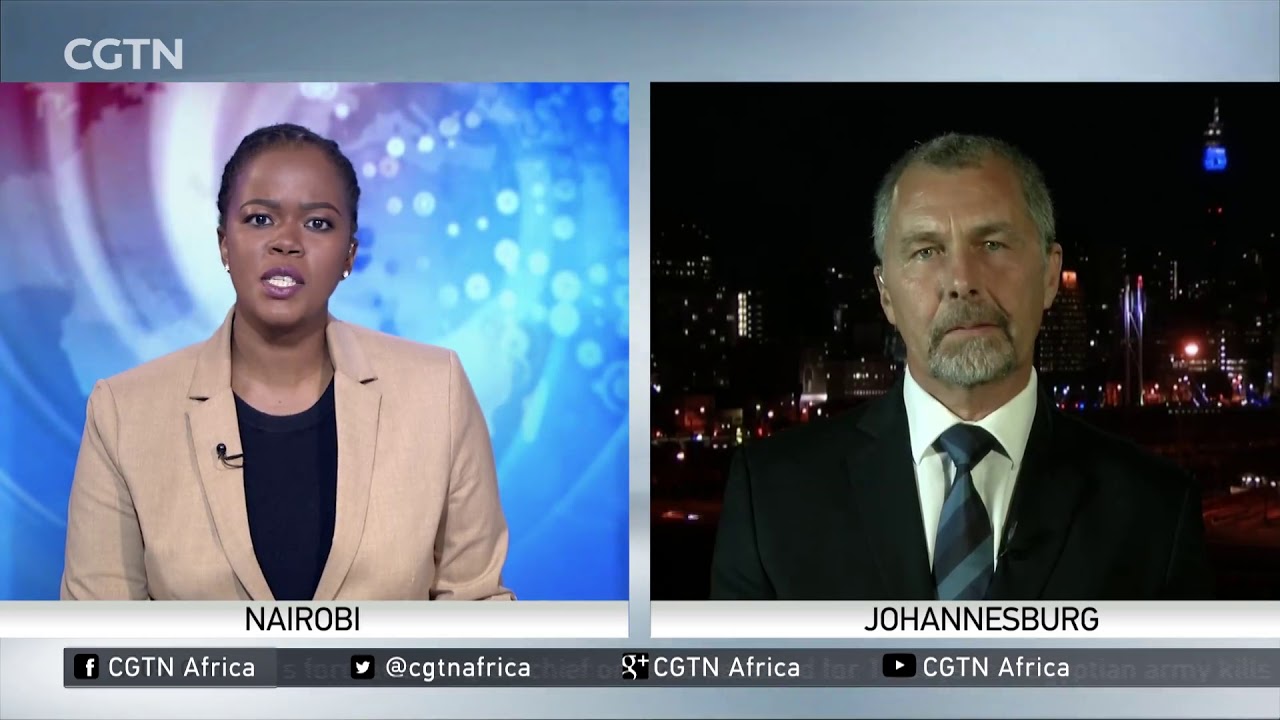 South African police raid home of family with ties to Zuma - YouTube
