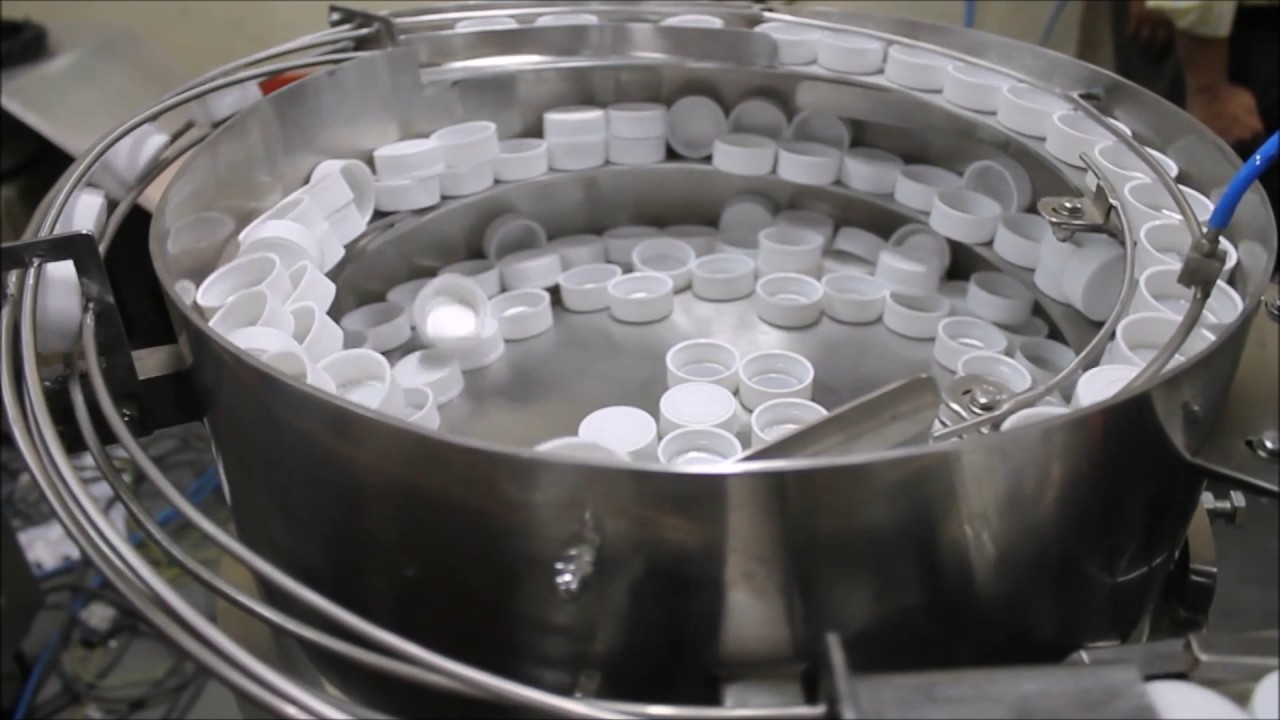 Cap Feeder - YouTube