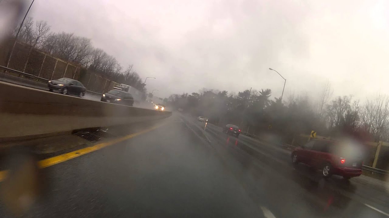 cars hydroplaning out of control in the rain - YouTube