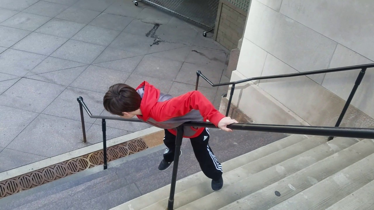Sliding down the handrail in Chicago - YouTube