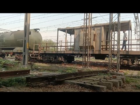 This view of the Indian Railway goods train loaded with oil - YouTube