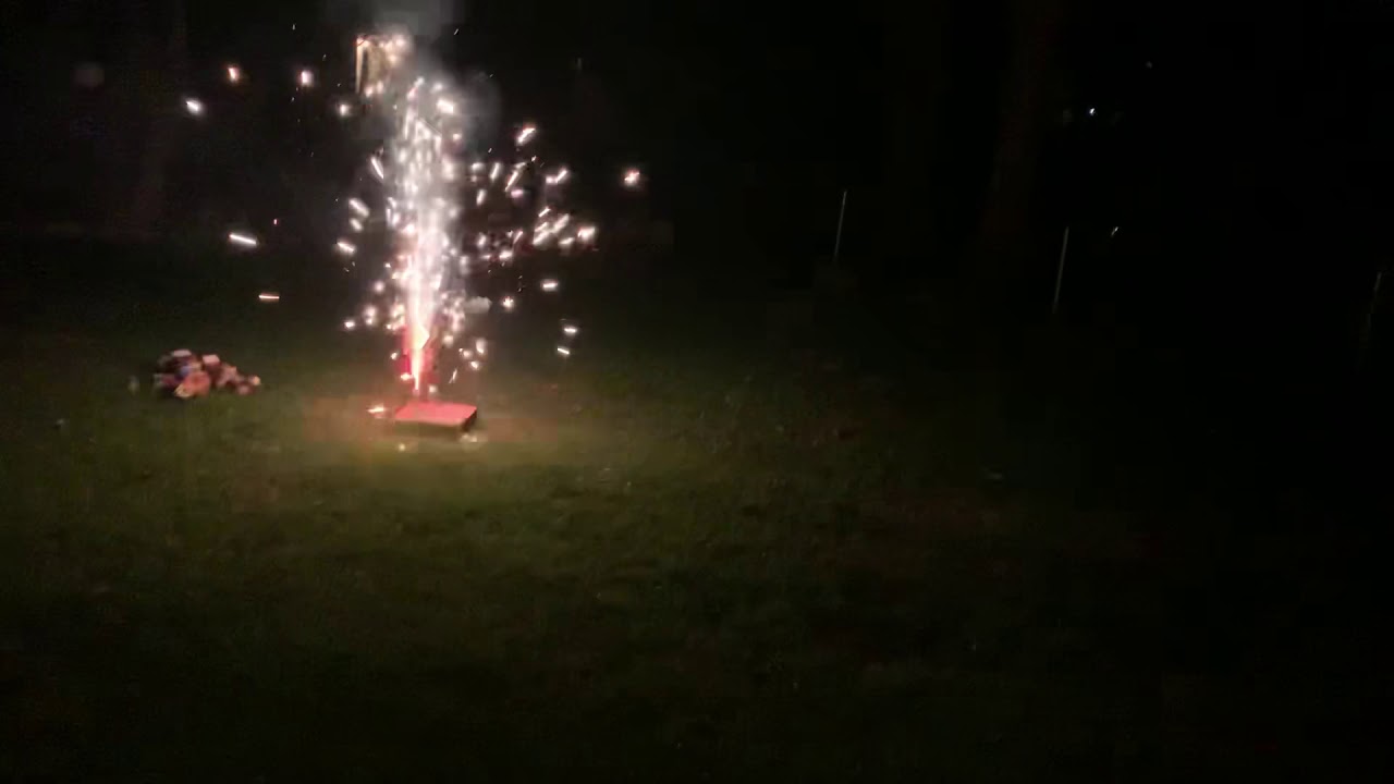Lighting up fireworks in the back yard - YouTube