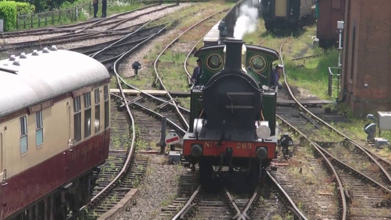 H-class tank engine takes on water and sets off from Sheffield Park ...