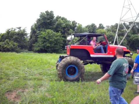 2 1/2 ton Jeep on 54 cut Boggers - YouTube