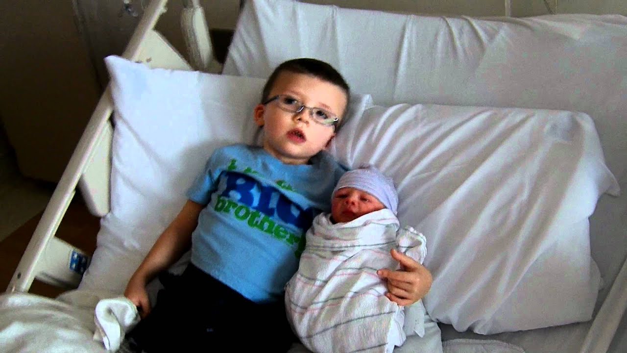 Big Brother Taking care of his new baby brother - YouTube
