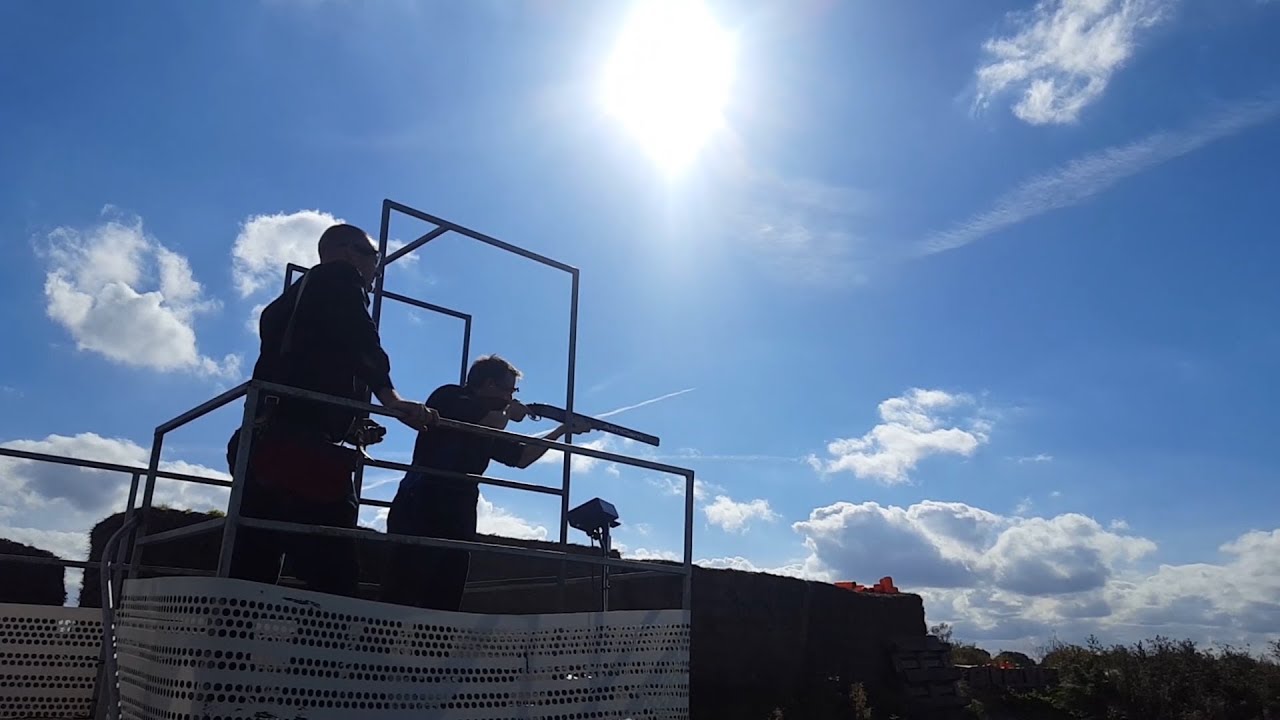 Breaking clays at Parklodge Shooting School - YouTube
