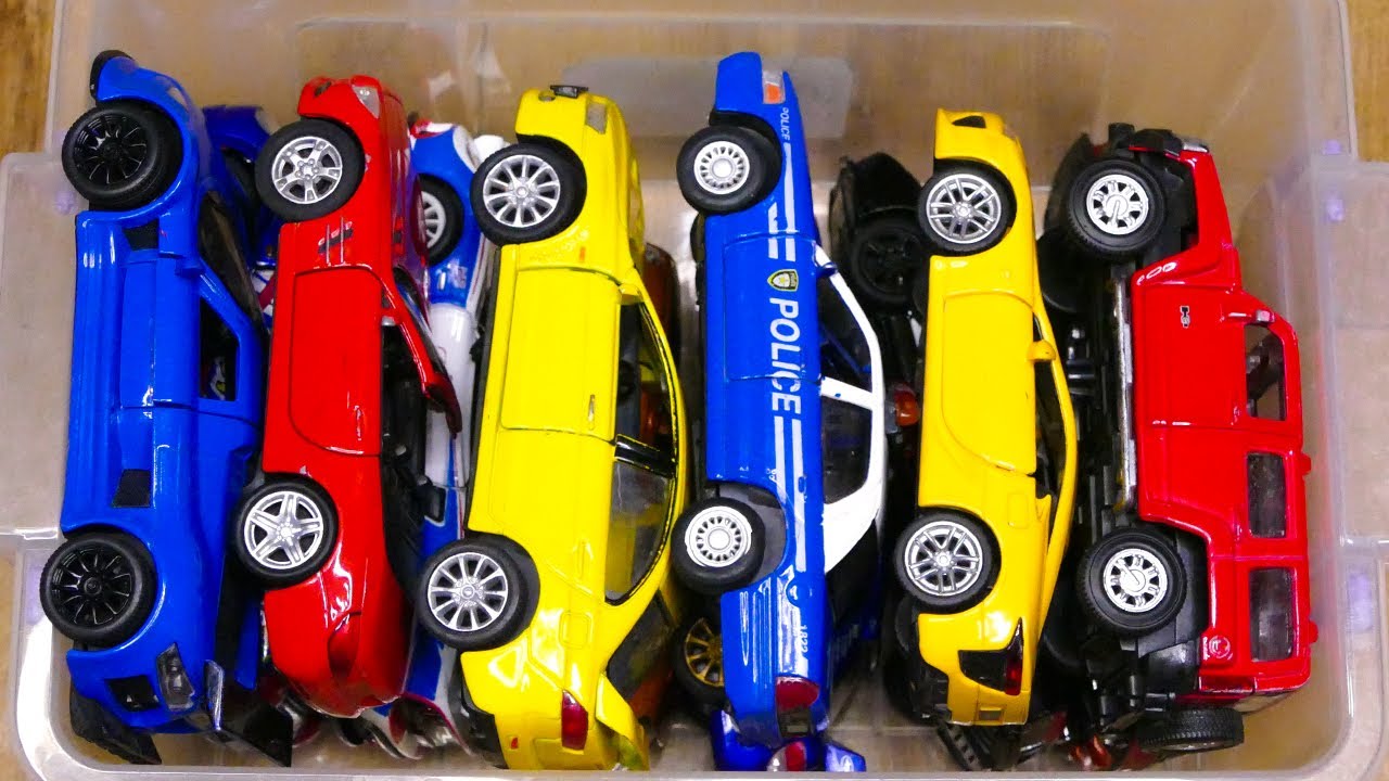 Box full of model Cars, Lotus, Lexus, Impreza, Porsche911, Hummer ...