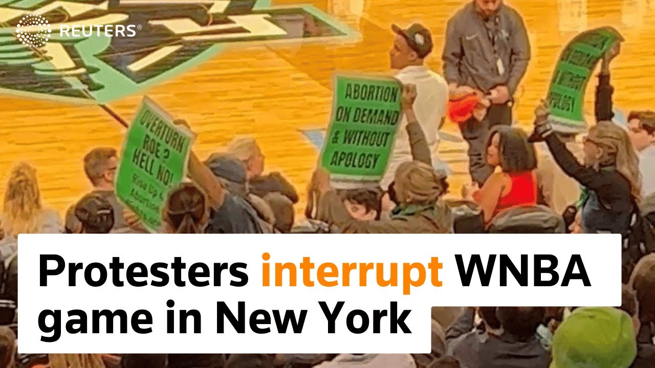Pro-choice protesters interrupt WNBA game in New York - YouTube