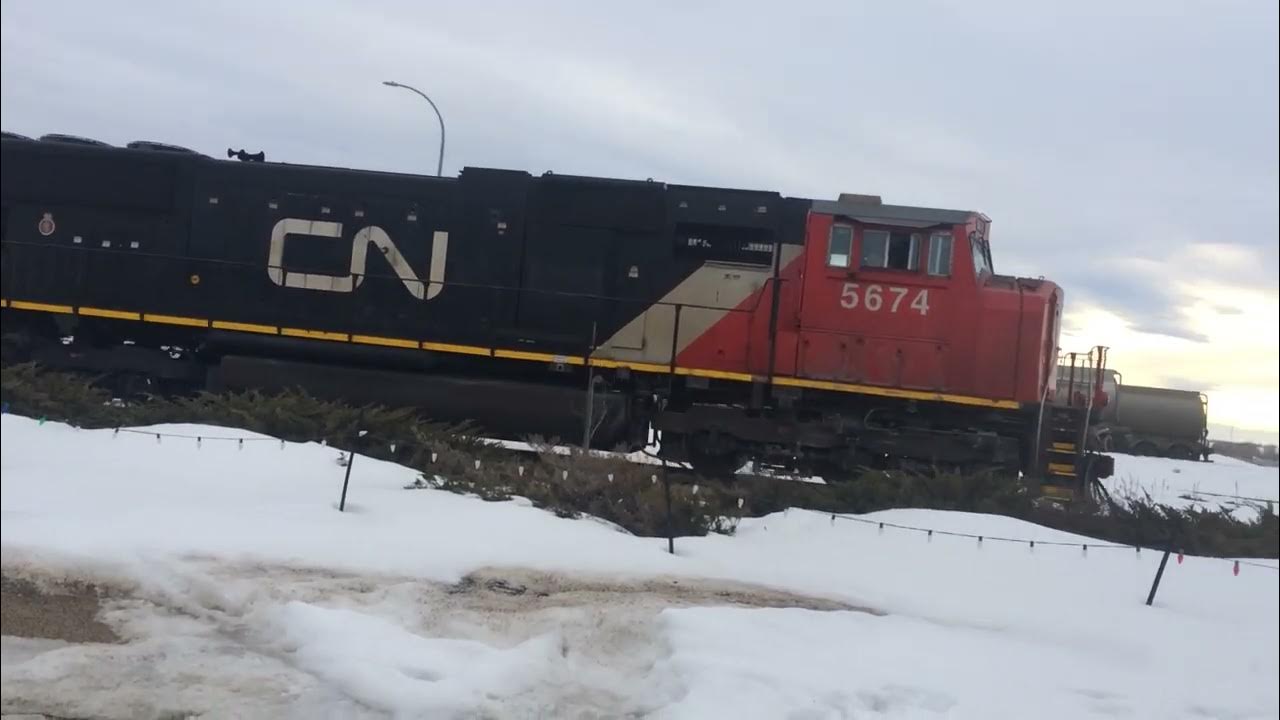 CN 5674 leads a northbound local train with a friendly engineer! - YouTube