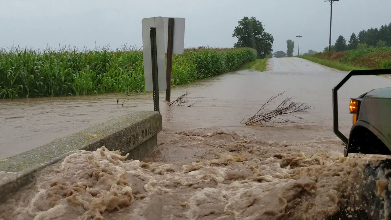 Humvee crossing flooded road S of Mauston - YouTube