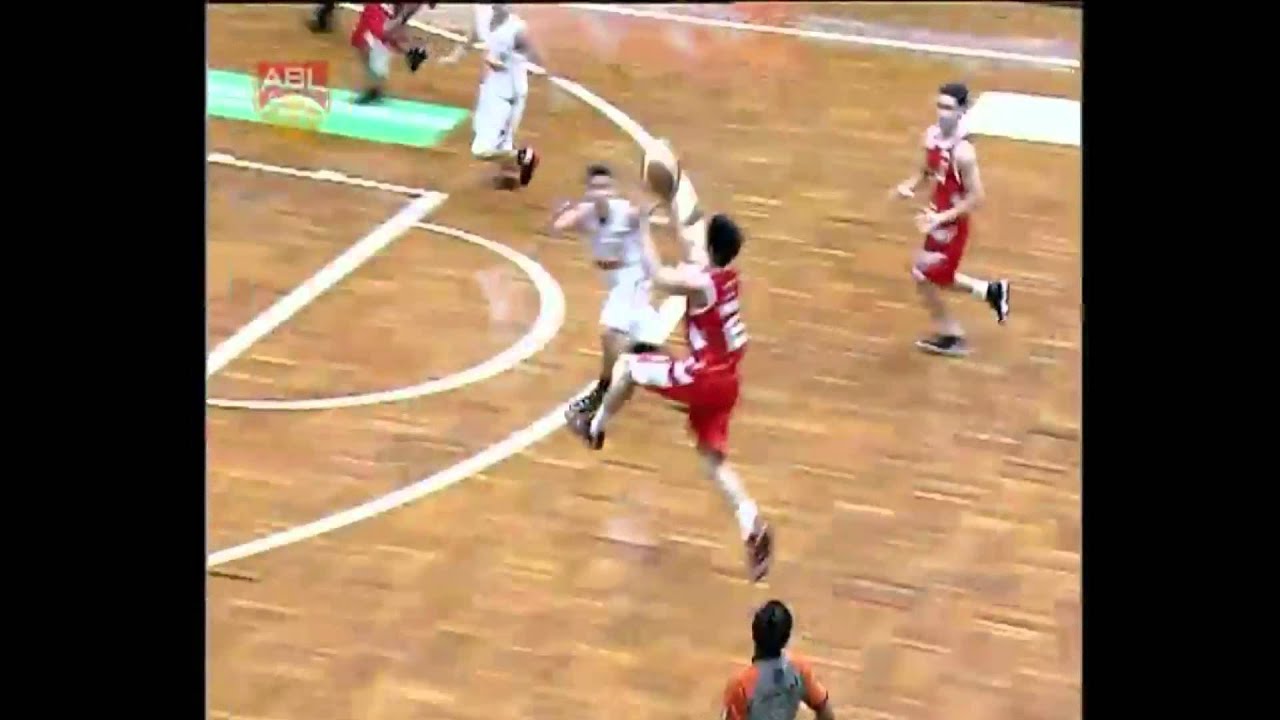 San Miguel Beermen's Gabe Freeman finishes an alley-oop from JR ...