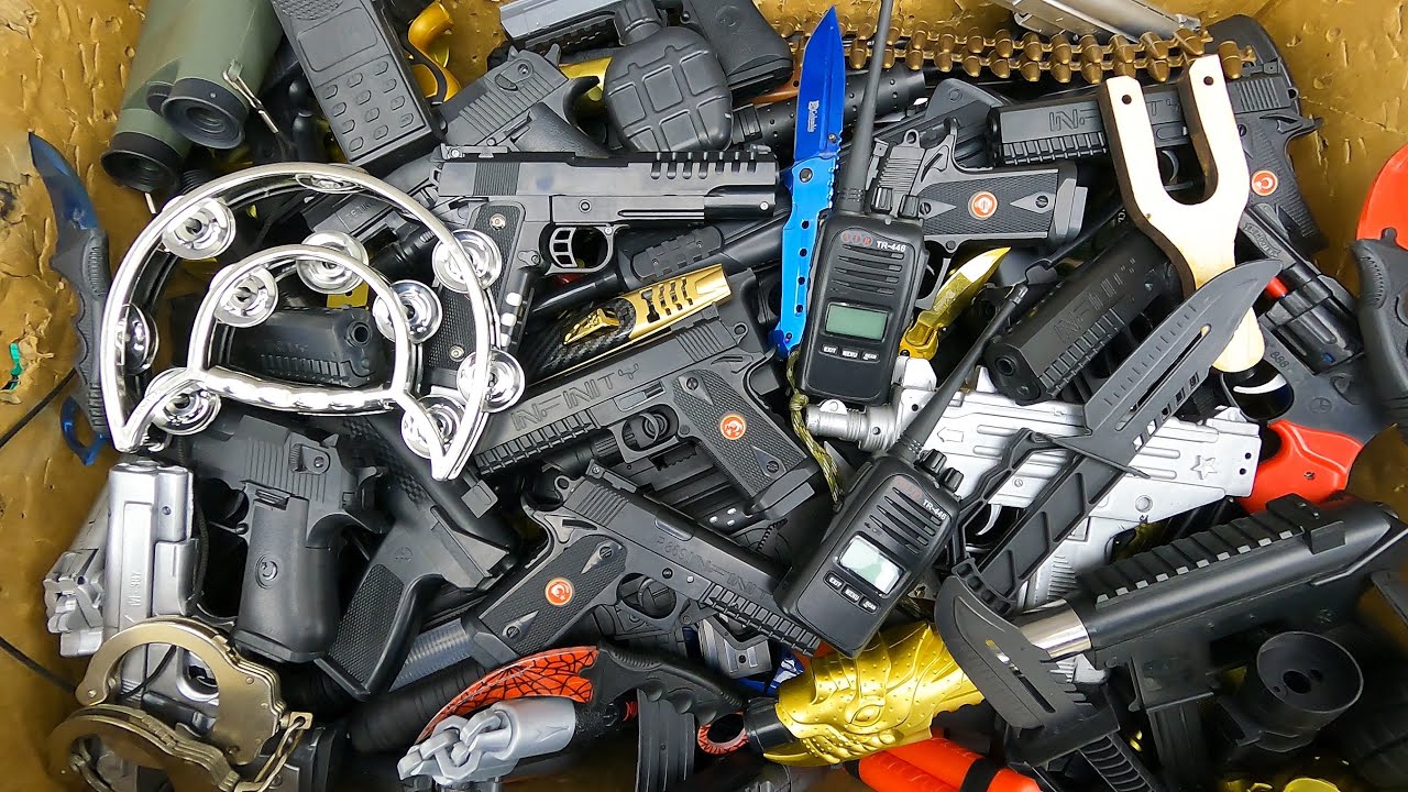 Black Toy Realistic Guns And Pistols, Tec-9, Uzi And Radios, Knives And ...