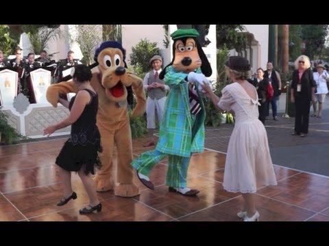 Goofy and Pluto swing dancing at the opening of Buena Vista Street at Disney California Adventure