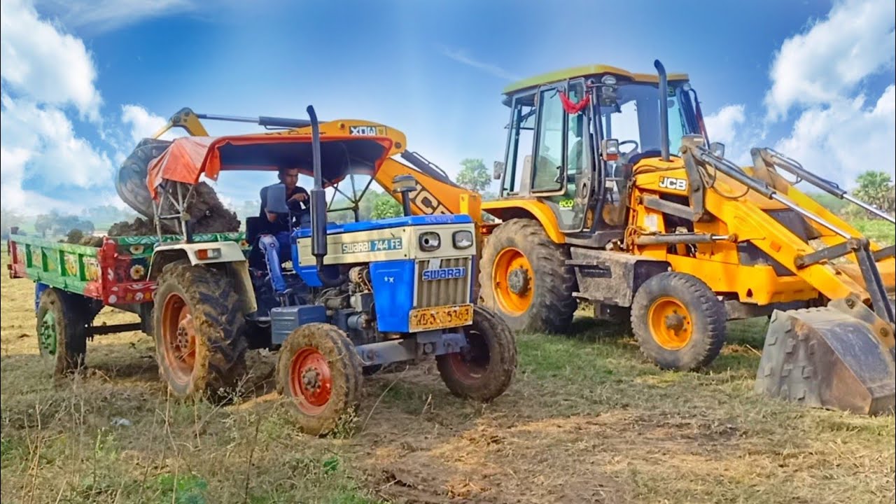 New Jcb 3dx Backhoe Loader Machine Loading Red Mud In Swaraj 744 FE ...