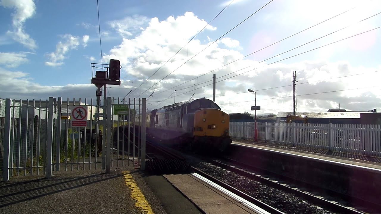 class 37 through penrith with a few yellow network rail coached (horn ...
