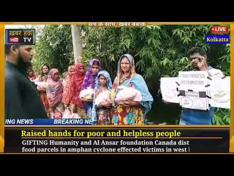Raised hands for poor and helpless people.GIFTING Humanity and Al Ansar foundation Canada distribute
