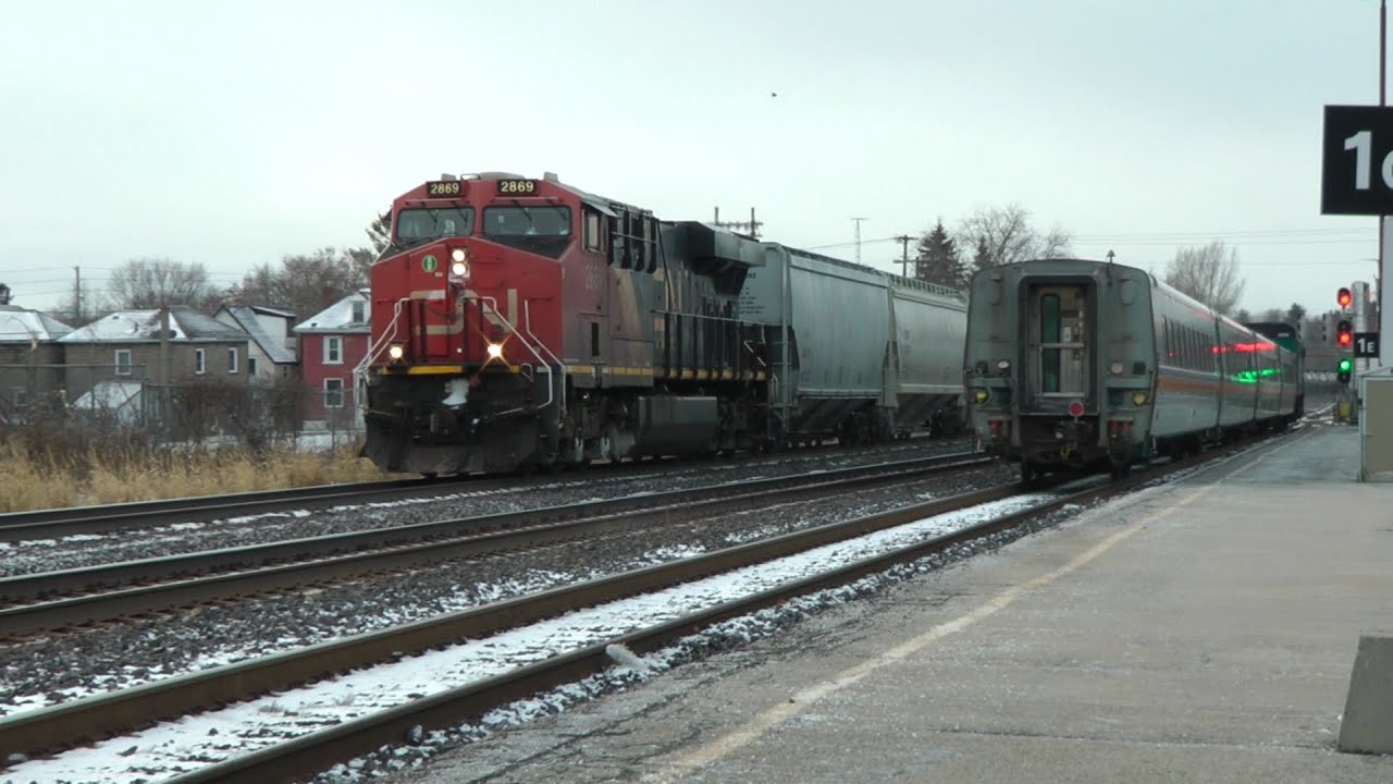 CN Train 376 Eastbound Emerges From Behind VIA Train 63 Westbound ...