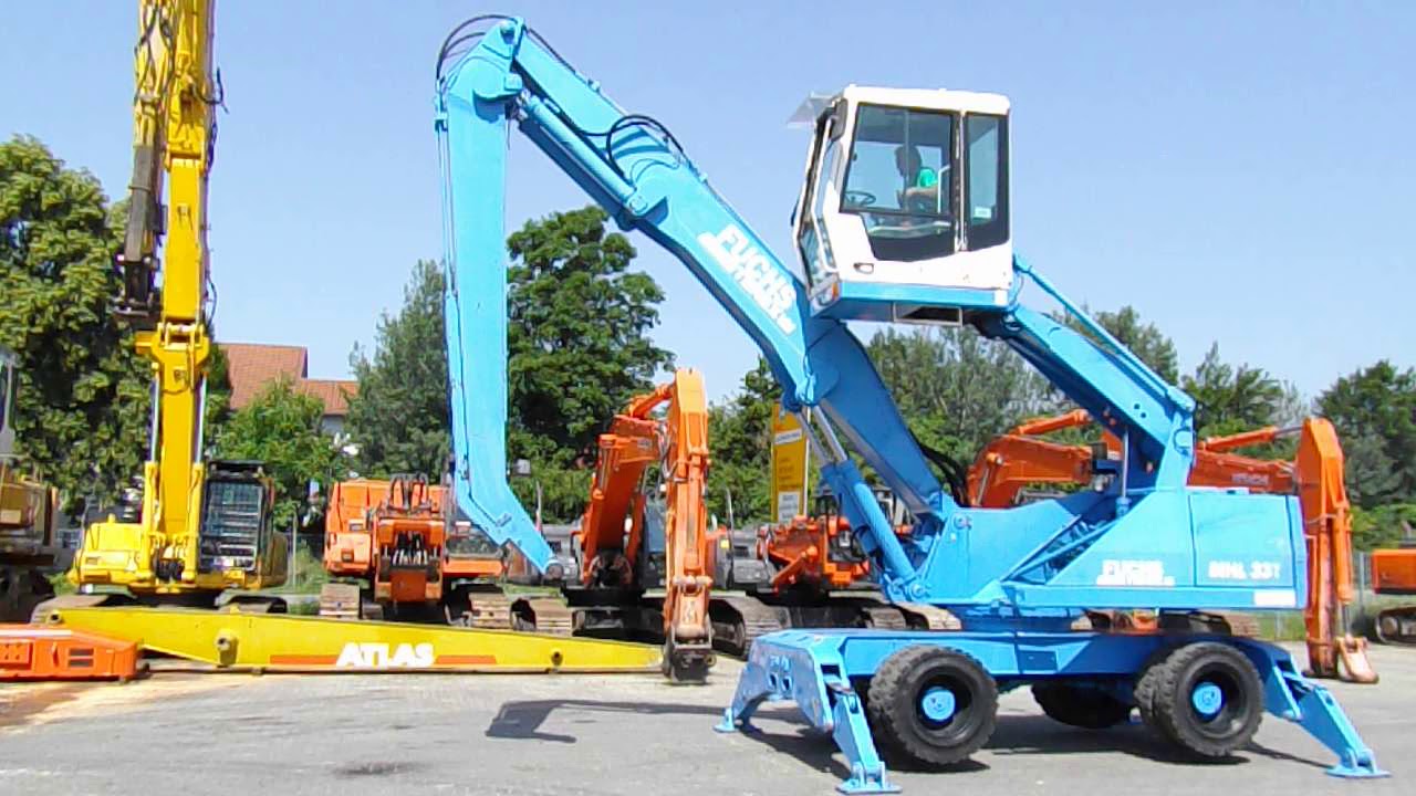 Fuchs MHL331 Umschlagbagger material handler demo - YouTube
