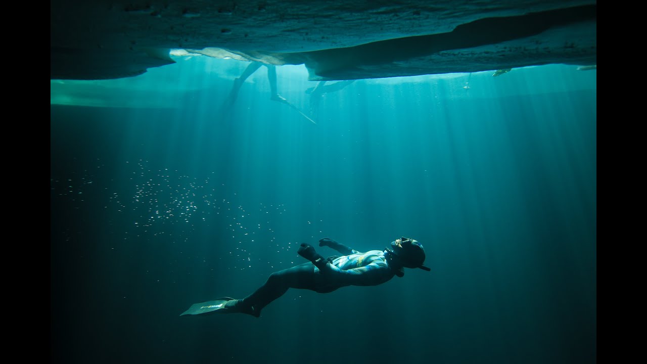 Freedive under a frozen lake - YouTube