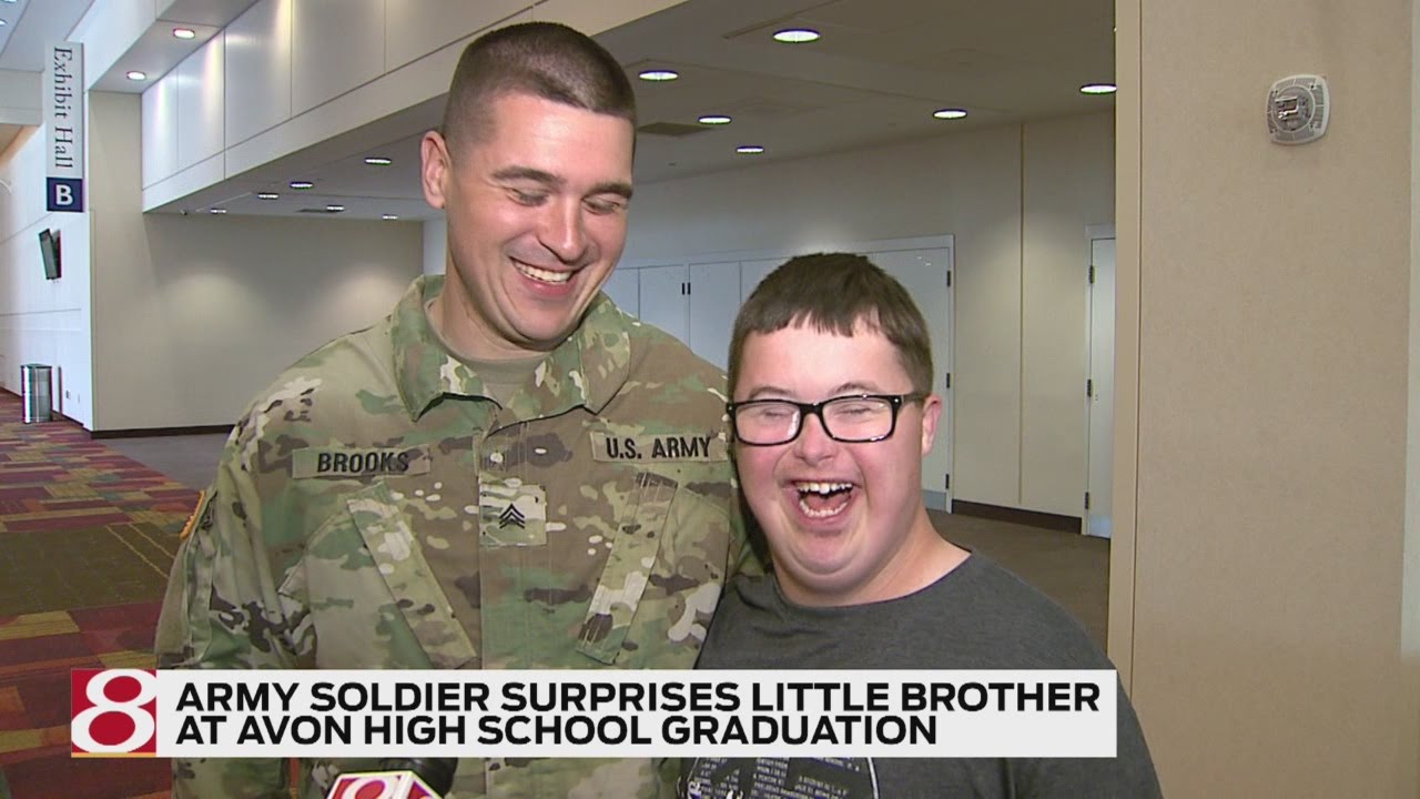 Army soldier surprises little brother at HS graduation - YouTube