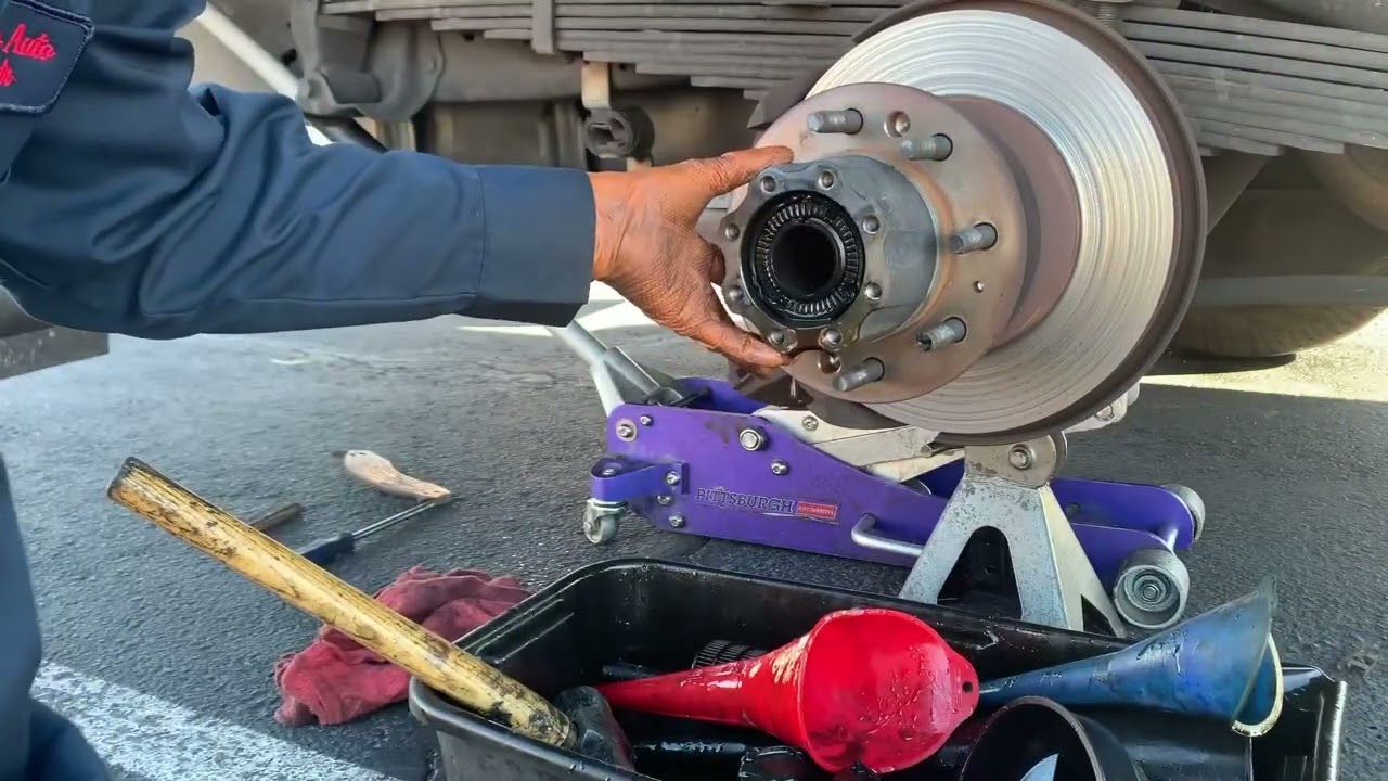 Replacing rear brake pads and rotors on a 2002 Ford e- 450 - YouTube