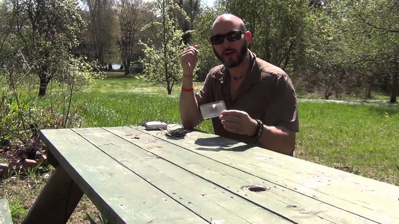 Fire Starting with a Magnifying Glass / Fresnel Lens - YouTube