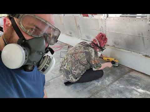 Skoolie bus conversion, Sara doing some grinding while I bug her.