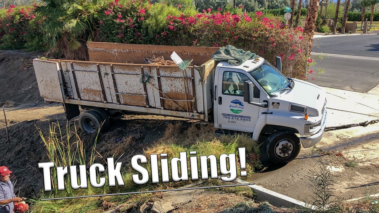 Landscape Truck Sliding Into Ditch! Tow Truck To The Rescue - YouTube