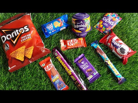 Unwrapping Doritos nacho cheese corn chips , Nestle KitKat and some ...