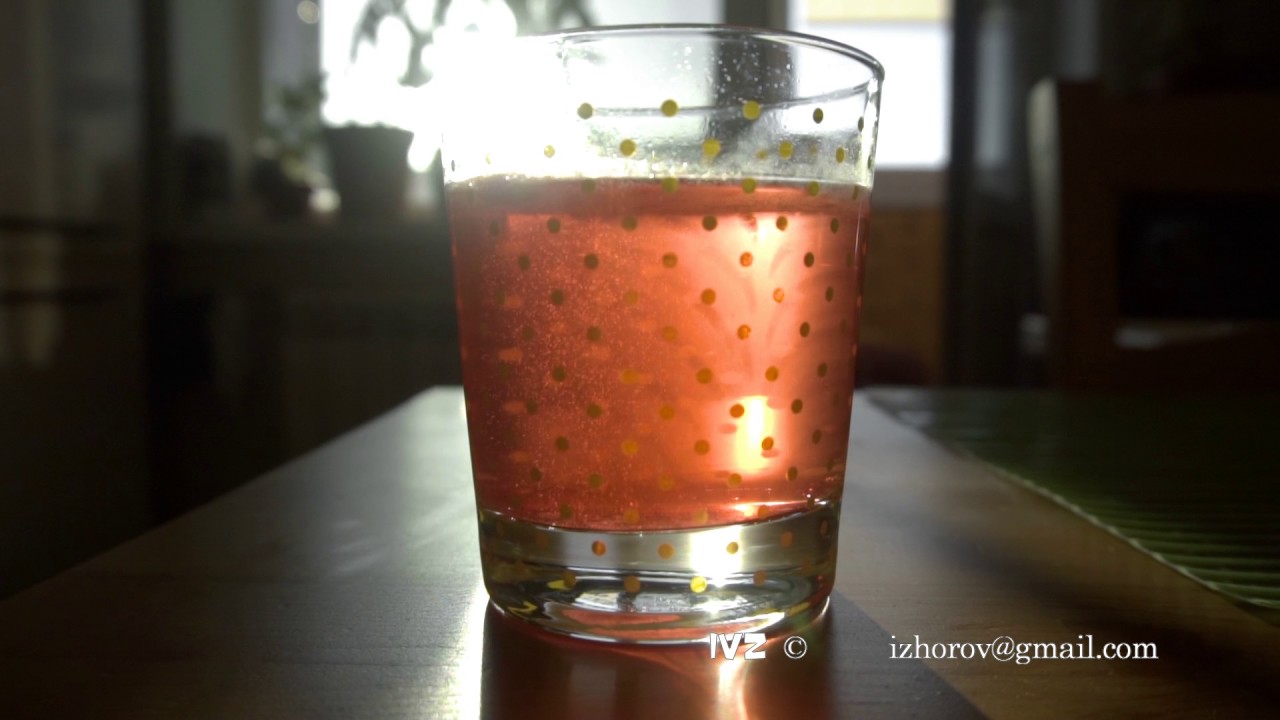Dissolving Aspirin fizzy pill in glass of water - YouTube