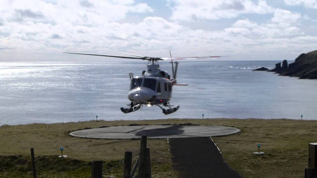 Atlantic Airways Helicopter taking off from Mykines Island Heliport ...