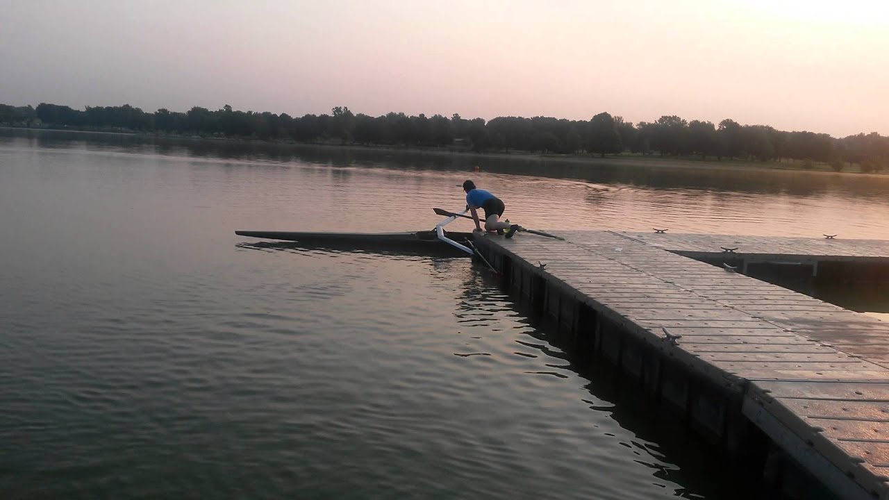Getting out of a scull from a high dock - YouTube