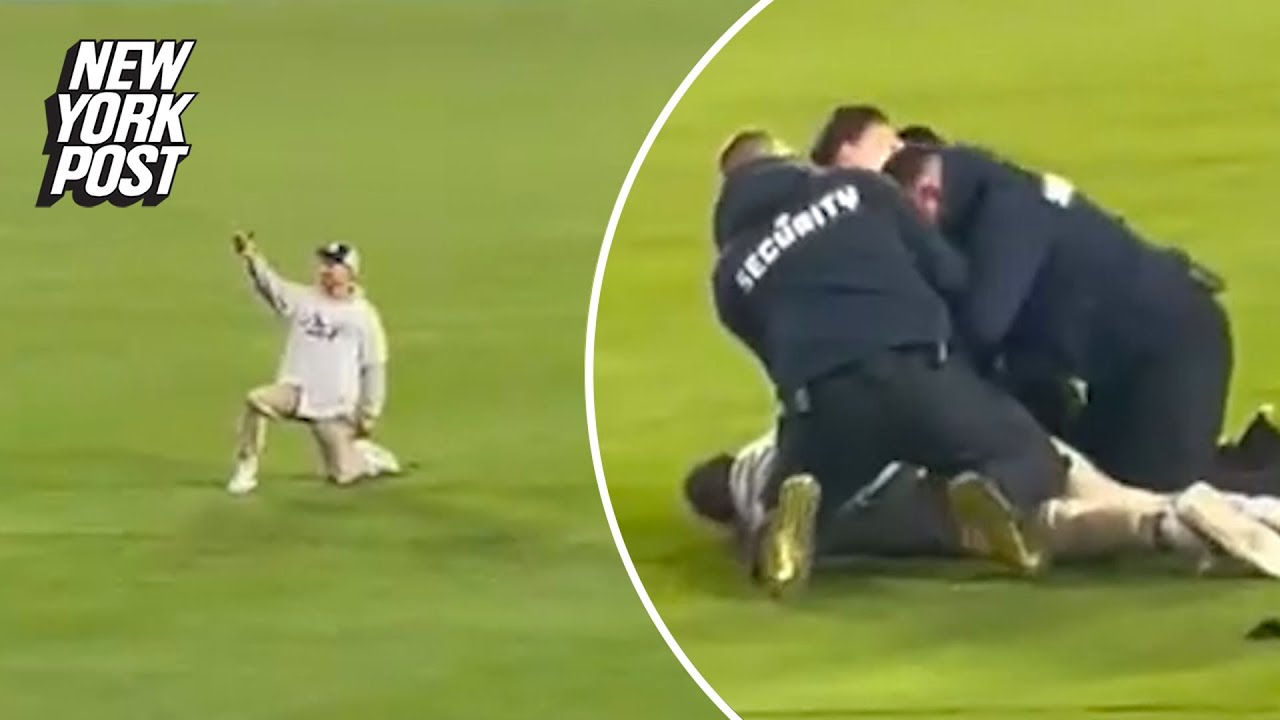 Dodgers fan gets tackled by security in disastrous on-field proposal ...
