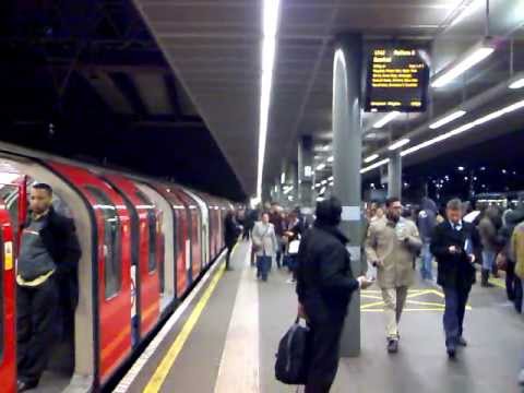 Night time east & westbound Central Line trains arriving & departing ...
