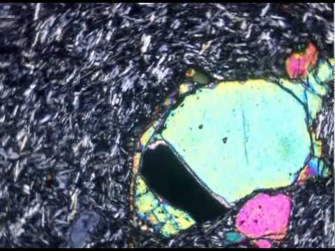 Olivine in basalt (XPL) - YouTube
