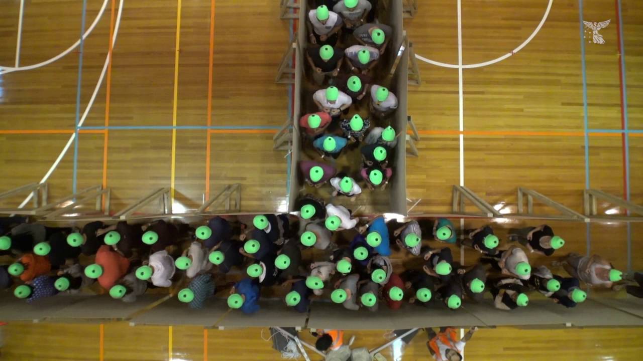 Crowd dynamics experiment: Merging crowds during an evacuation - YouTube