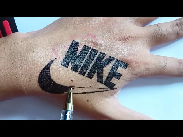 Nike Swoosh Tattoo On Arm