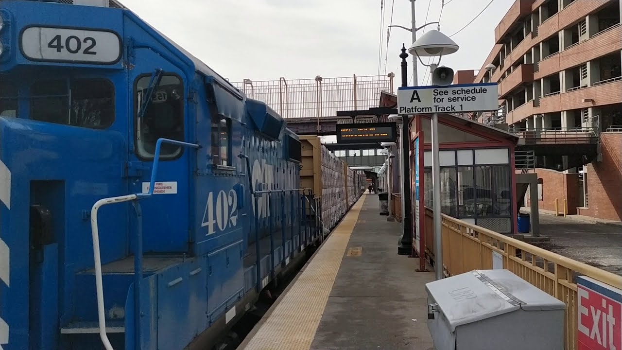 LIRR MP15ac 159 and CIT 402 lead kleet lumber freight through ...