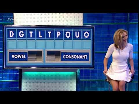 Rachel Riley @Slight skirt lift