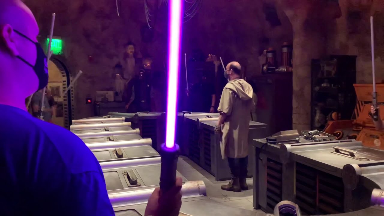 Adam builds a lightsaber at Savi’s Workshop - Galaxy’s Edge - YouTube