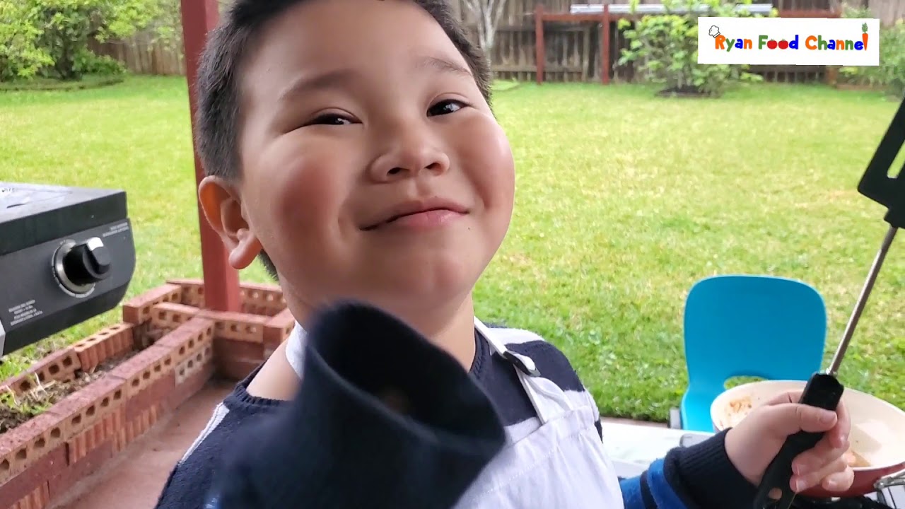 Ryan Cooking Salmon and Rice - YouTube