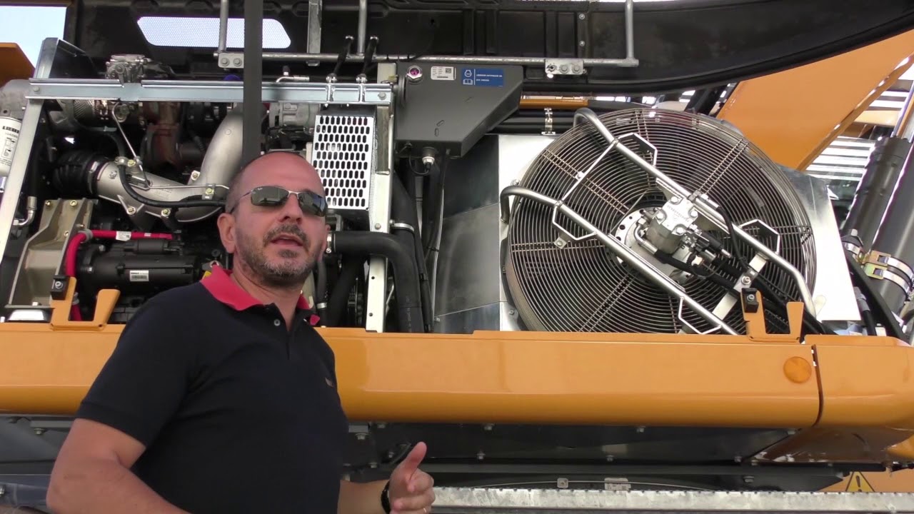 LIebherr LH24 M: gestione della manutenzione sottocofano - YouTube