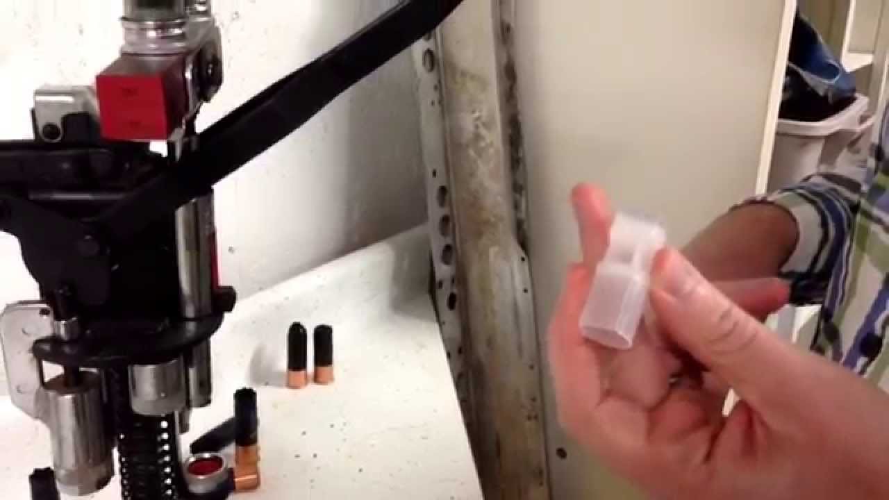 Reloading a shotgun shell - YouTube