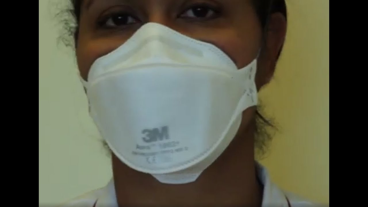 How tot put on safely and take off a facemask - YouTube